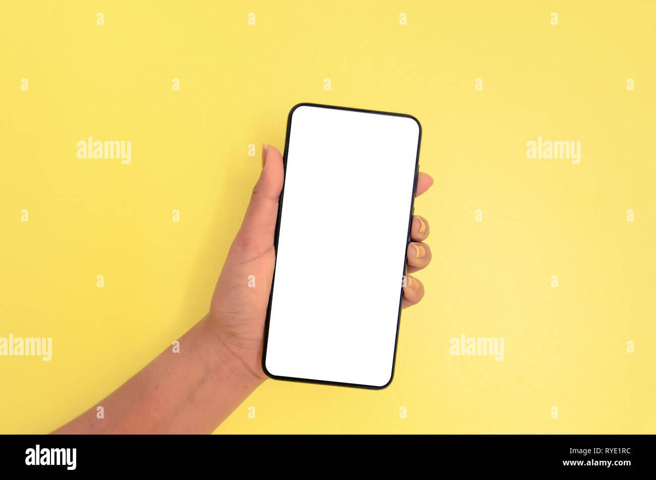 Human hand holding smartphone with white screen background, Mobile ...