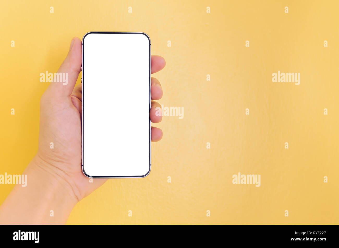 Human hand holding smartphone with white screen background, Mobile ...