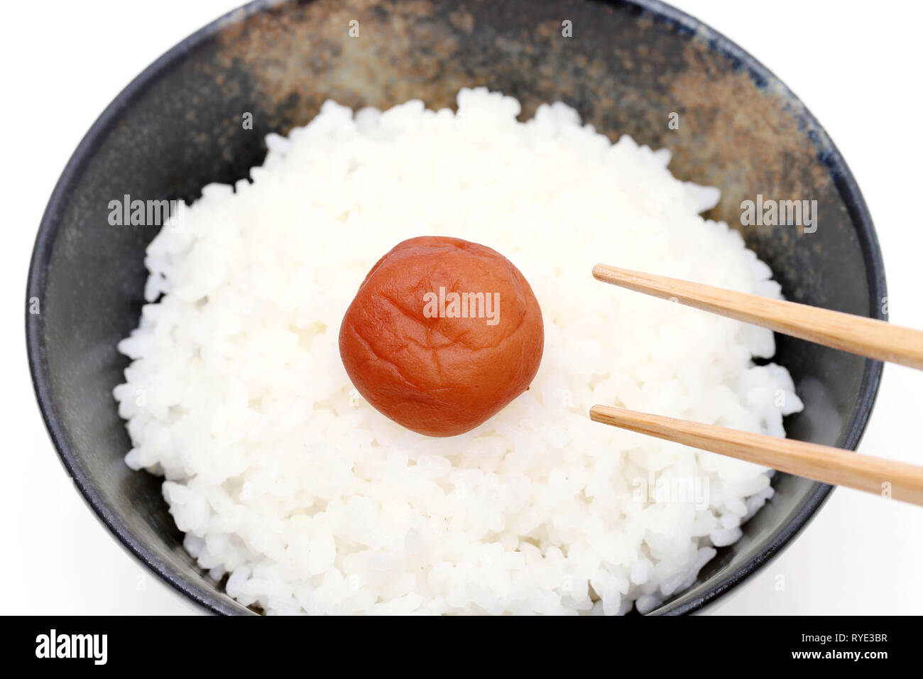 Japanese food, Umeboshi pickled salt plum on white rice, on white ...