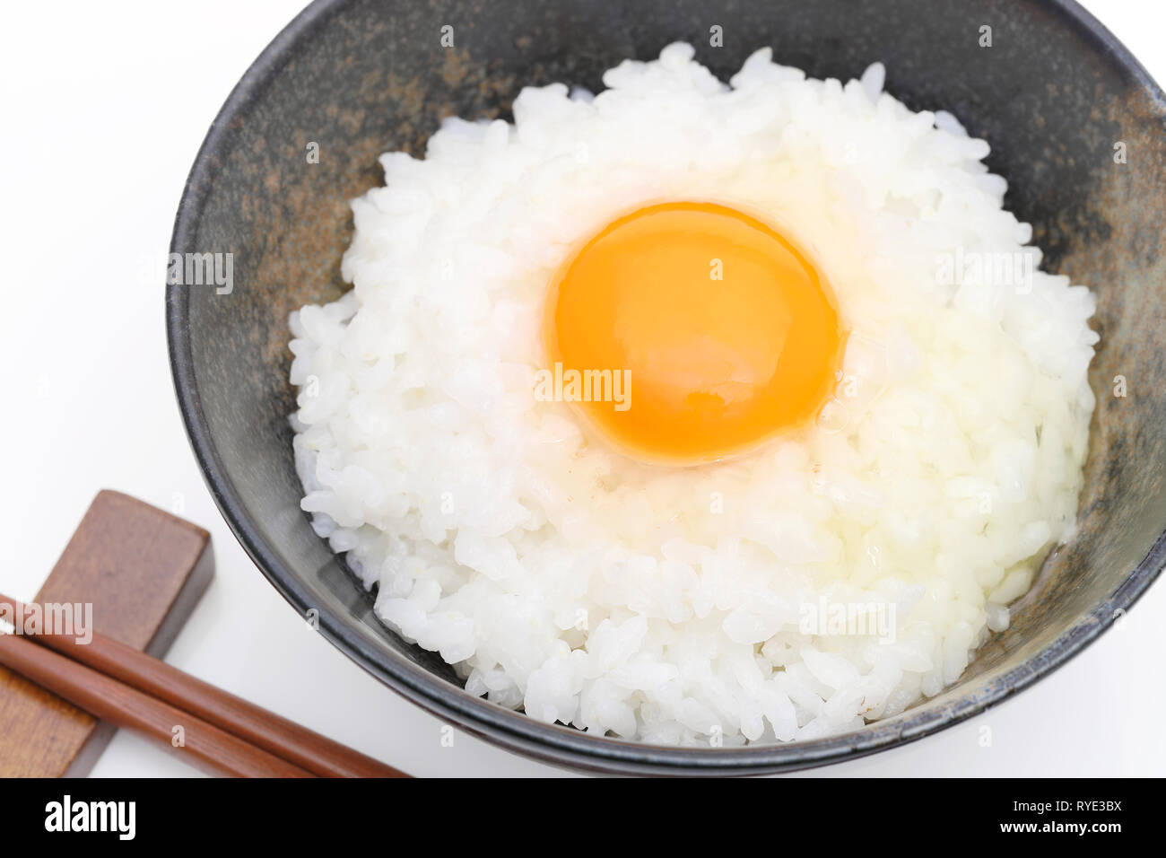 Close up of Japanese rice with raw egg, Tamago kake gohan Stock Photo ...