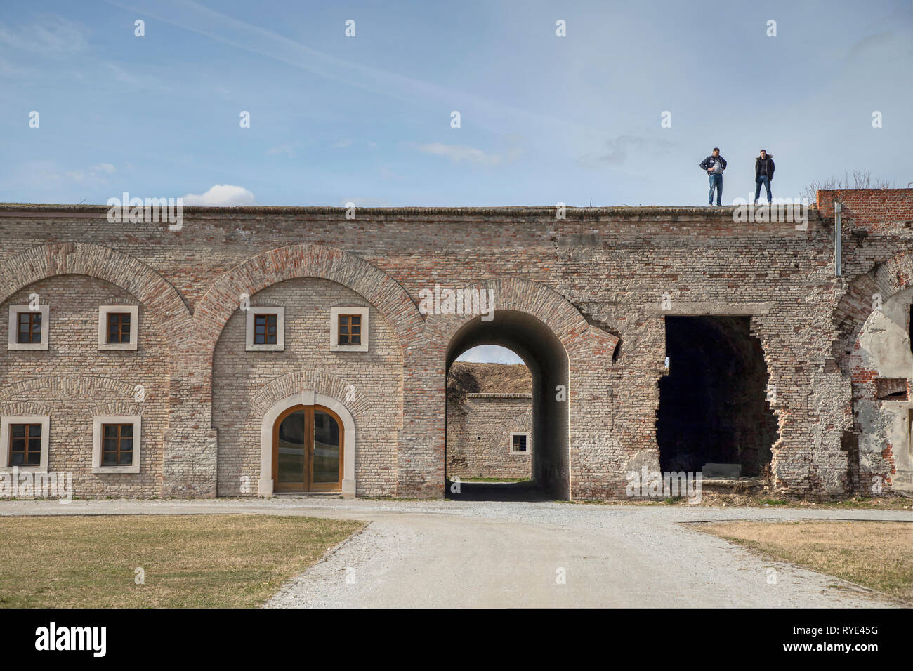 Croatia, March 2019 - Two men observing the Fortress of Slavonski Brod ...