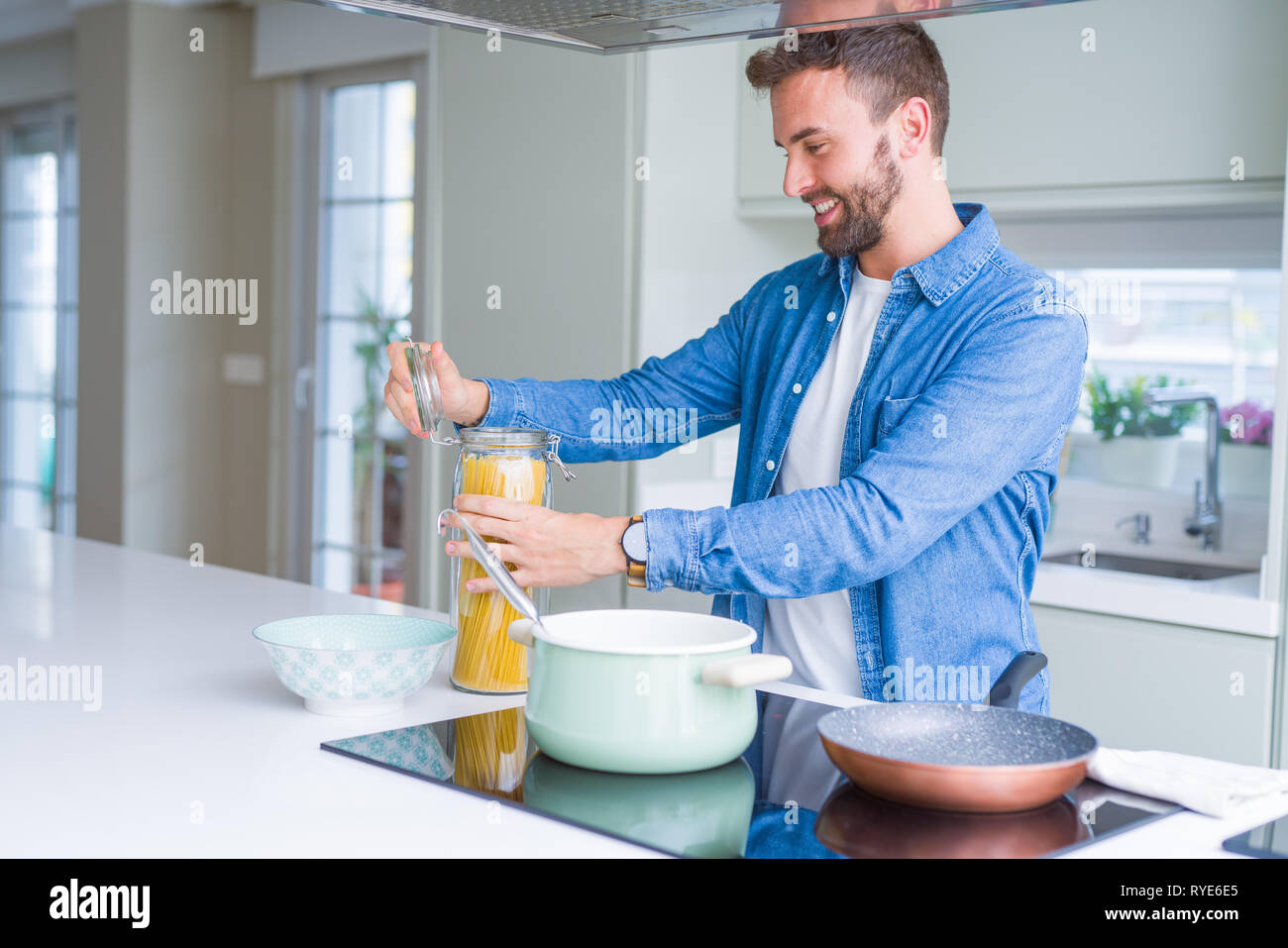 Hispanic boy eating pasta hi-res stock photography and images - Alamy