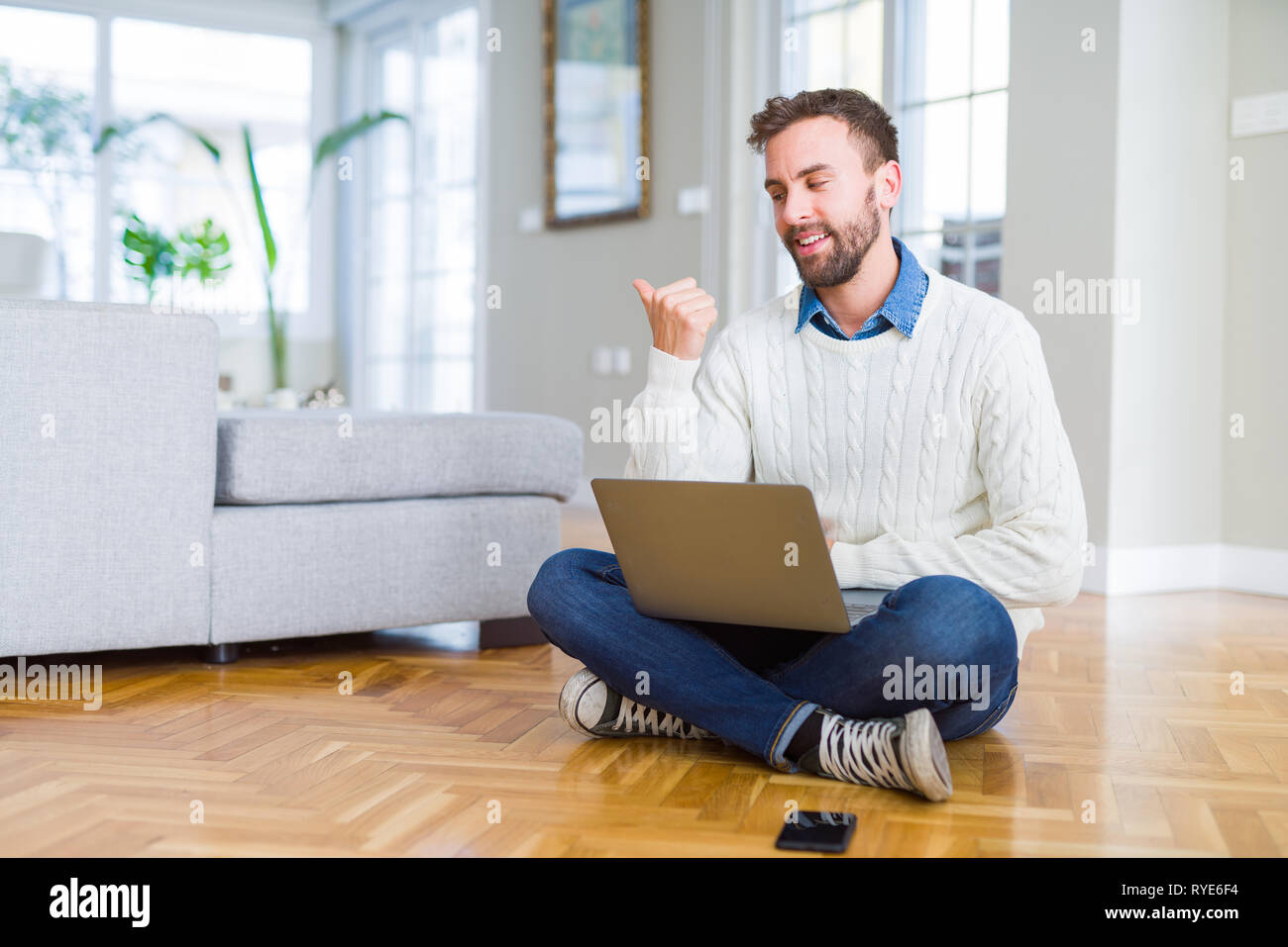 Handsome man wearing working using computer laptop smiling with happy ...
