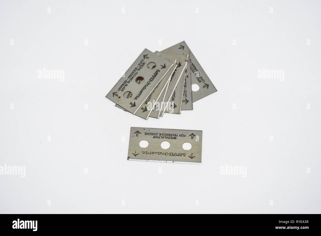 Close up view of metallic razors blade isolated on white background ...