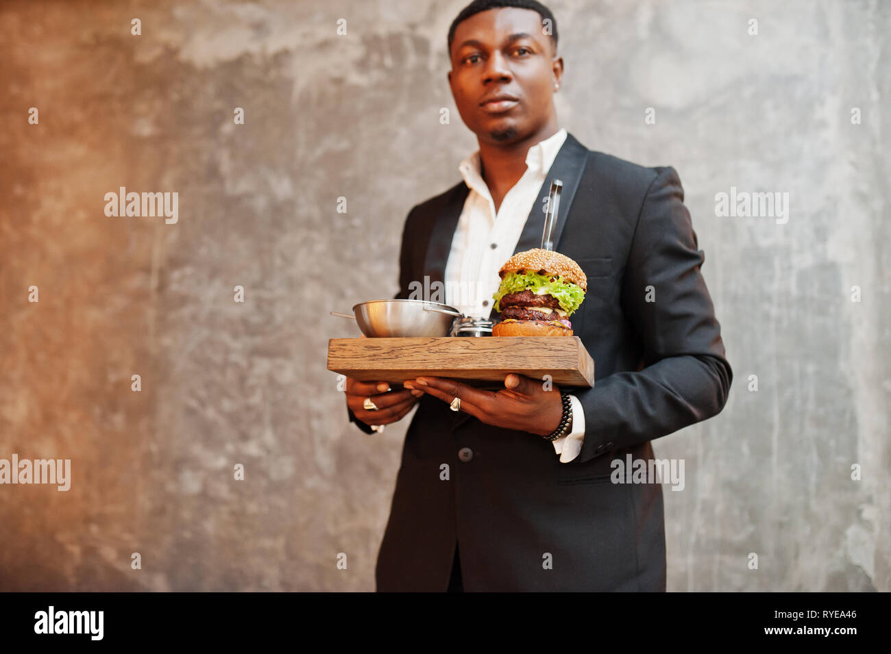 Fat man eating suit hi-res stock photography and images - Alamy