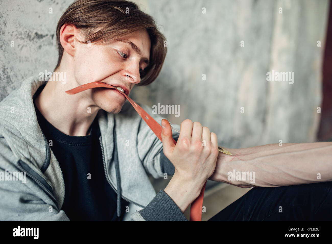 Male junky syringe doing hi-res stock photography and images - Alamy