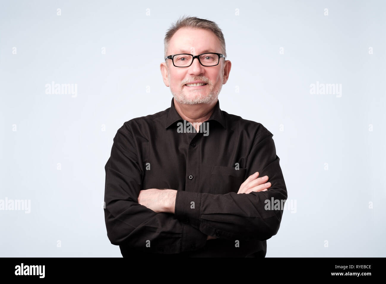 Arms crossed looking at the camera hi-res stock photography and images ...