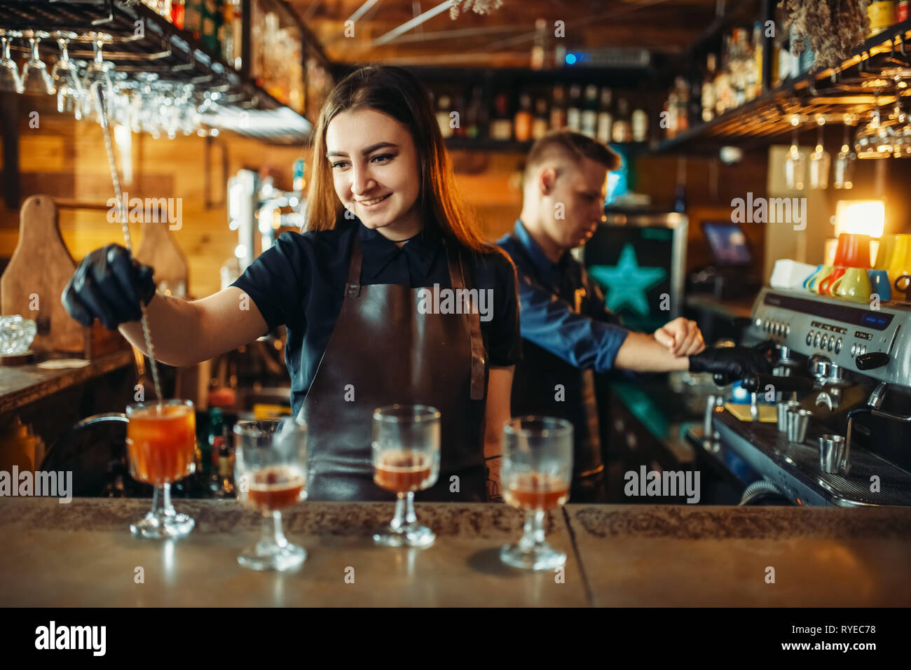 Night nightlife bar pub bartender hi-res stock photography and images - Alamy