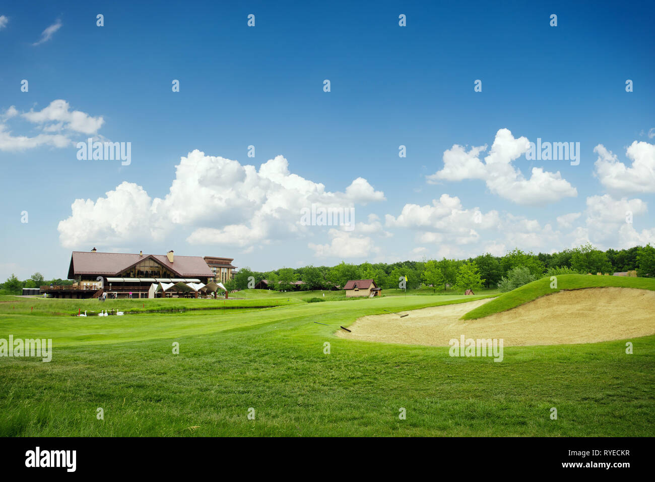 Grass and sand bunkers for golfing on golf course Stock Photo - Alamy