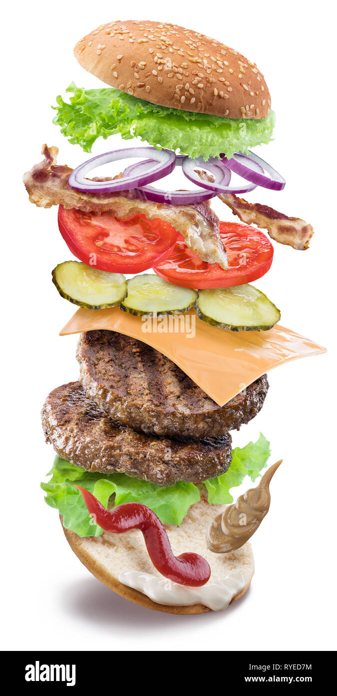 Hamburger ingredients falling down one by one to create a perfect meal ...