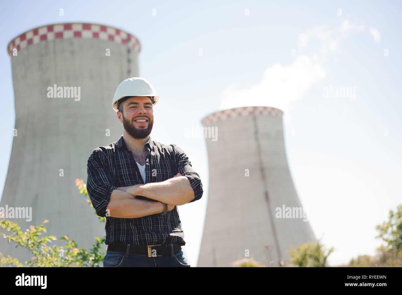 Portrait of an handsome engineer. Handsom electrical engineer at an ...
