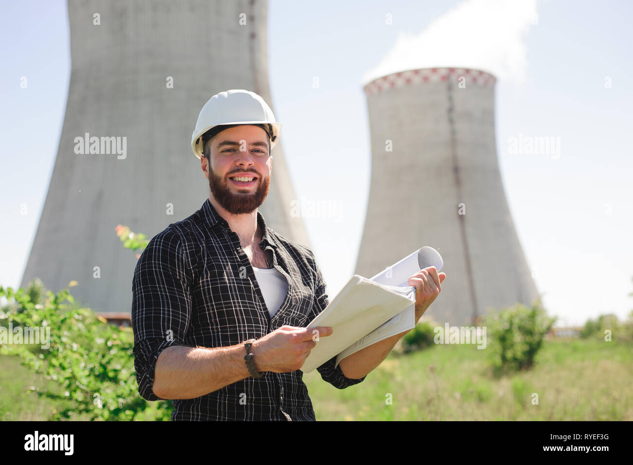 Portrait of an architect builder, serious civil engineer working with ...