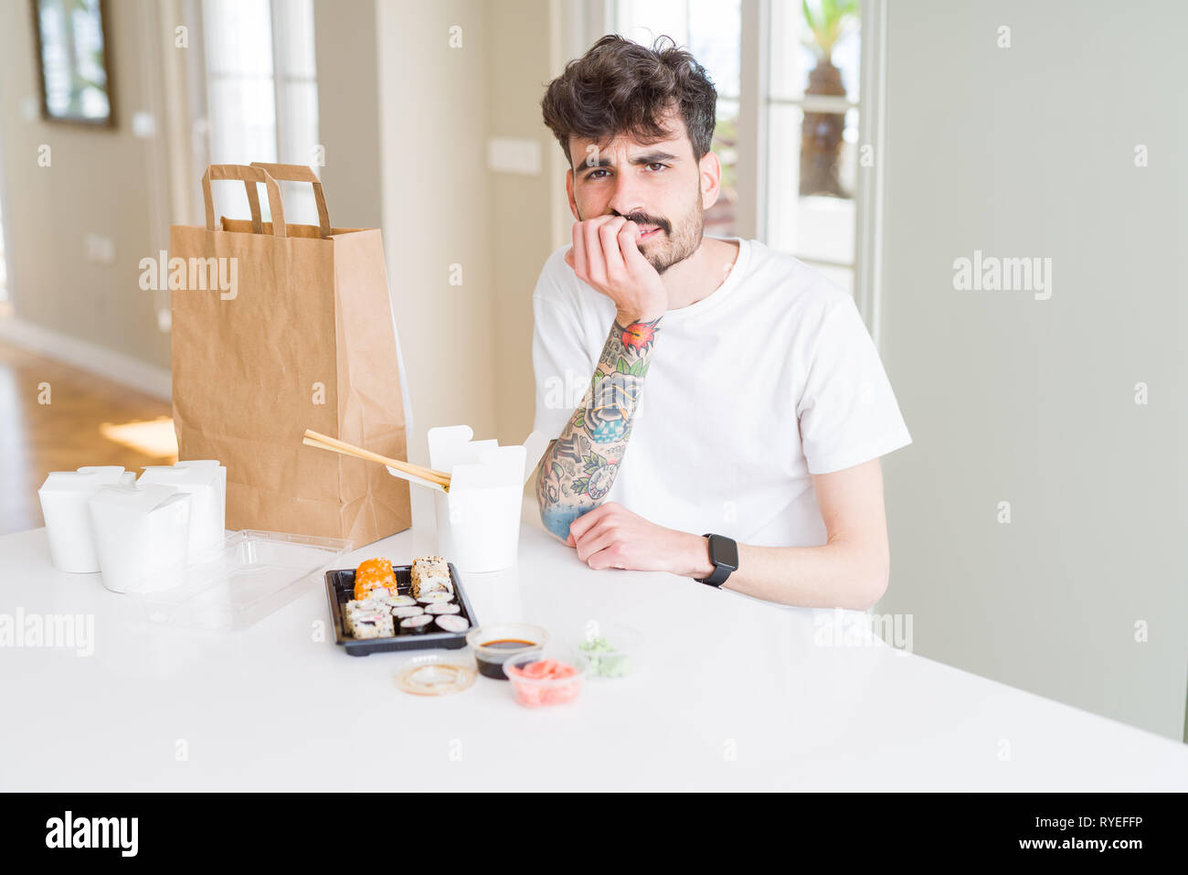 Shy young japanese man hi-res stock photography and images - Alamy