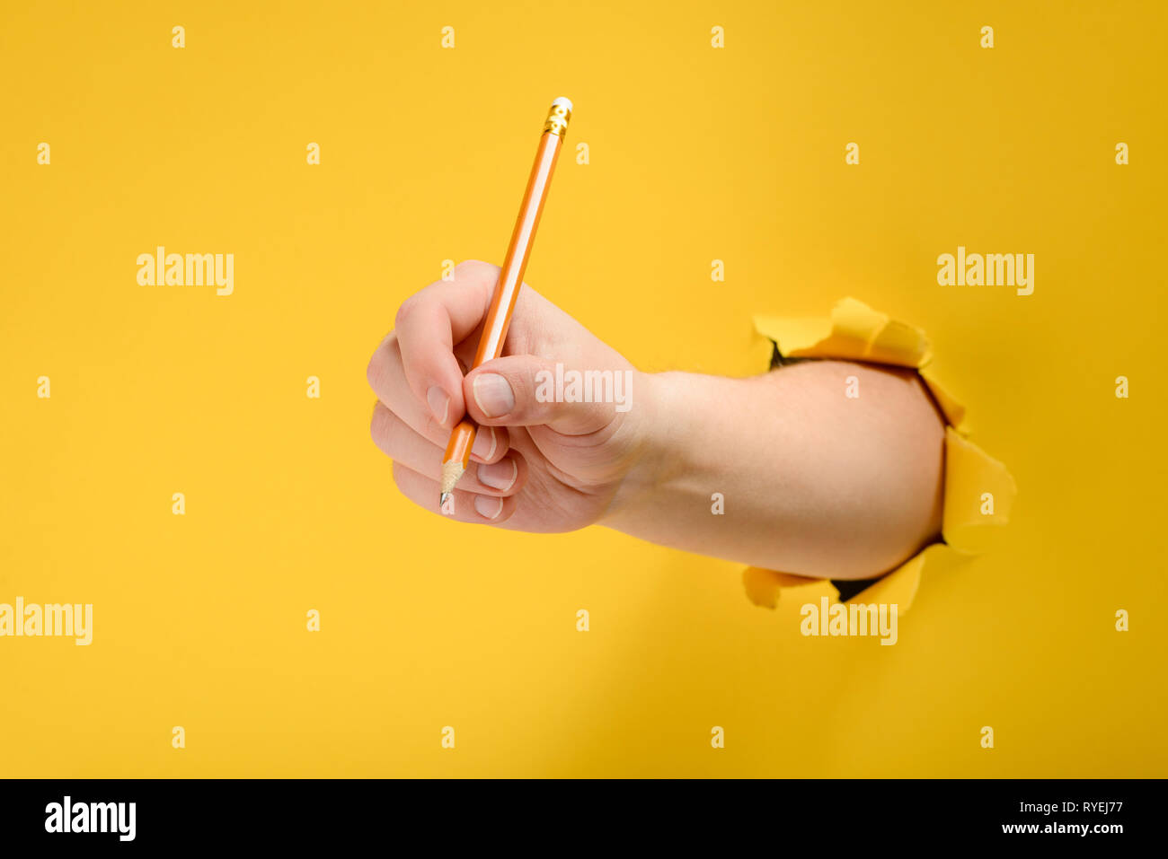 Hand writing with a pencil Stock Photo - Alamy