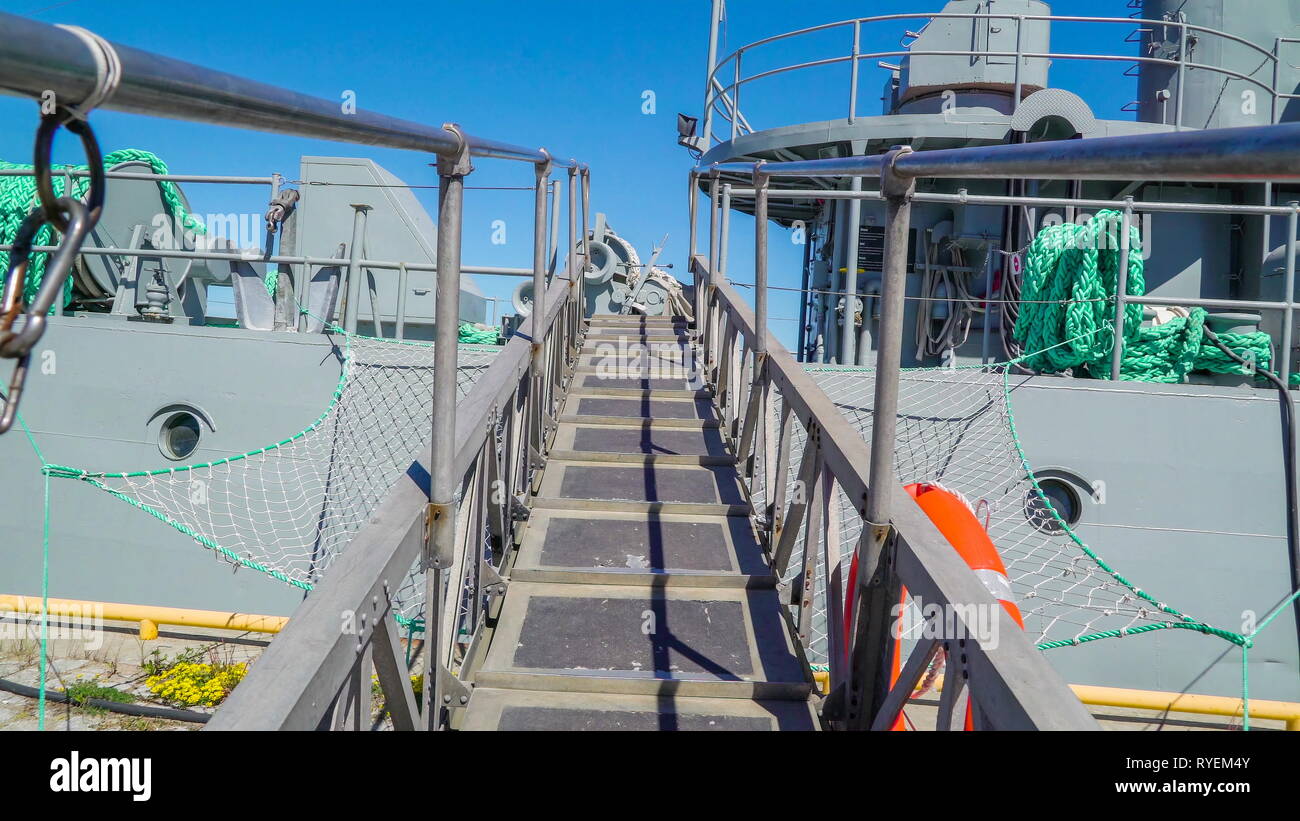 Metal steel stairs of the warship docking in Tallinn Estonia along with ...