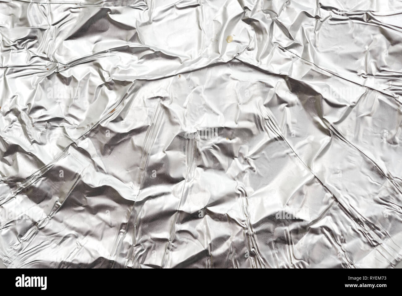 Wrinkled foil texture Stock Photo - Alamy