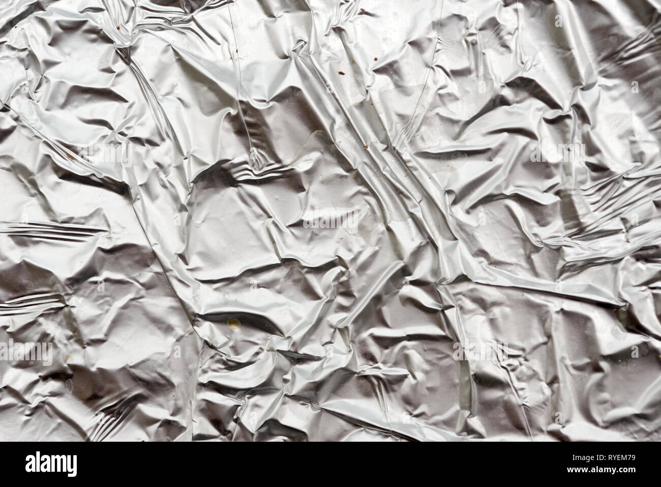 Wrinkled foil texture Stock Photo - Alamy