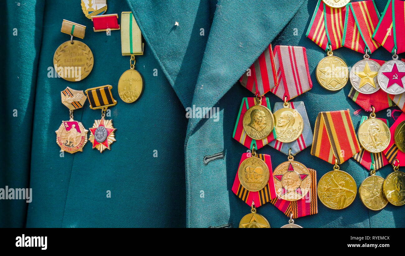 Closer look of the colorful medals on the uniforms of the Soviet union ...