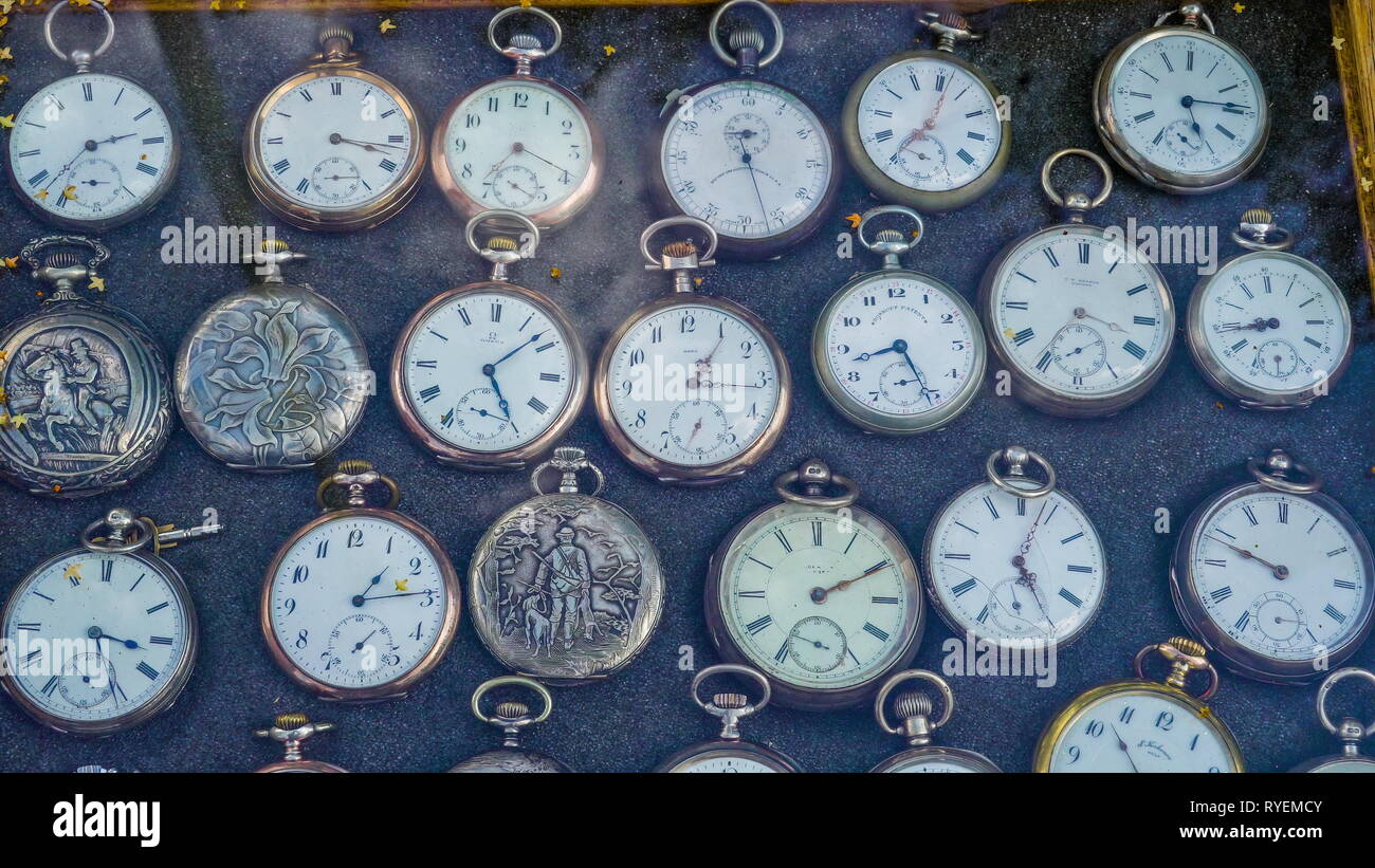 Small olds handy clocks on the table from the ancient vintage era ...