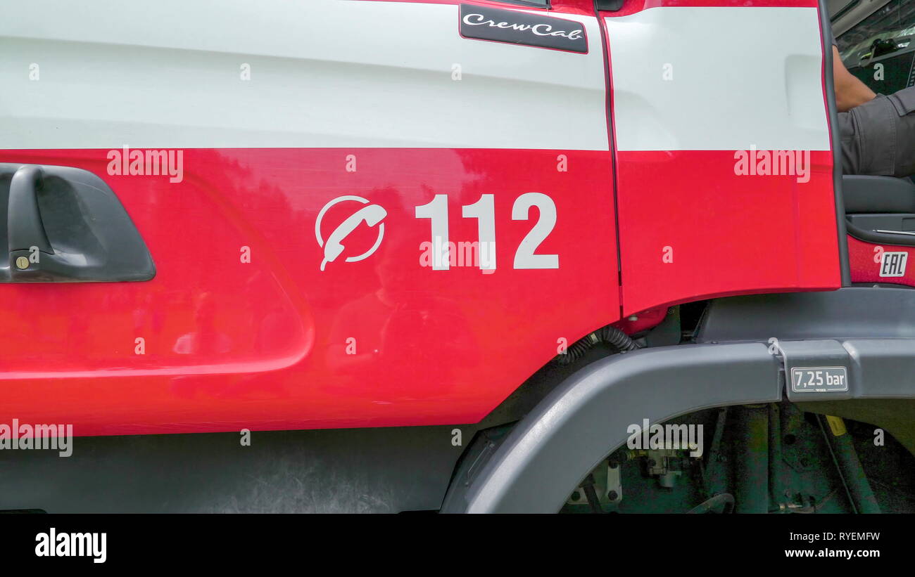 Closer look of the 112 number sign on the side of the red firetruck its ...