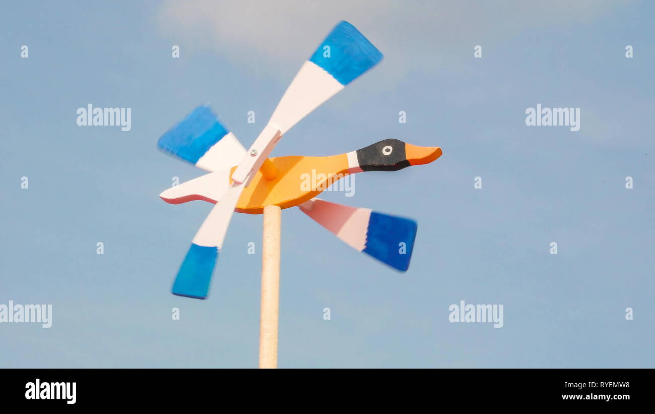 A bird toy with the turn around wings being sold for the kids on the ...