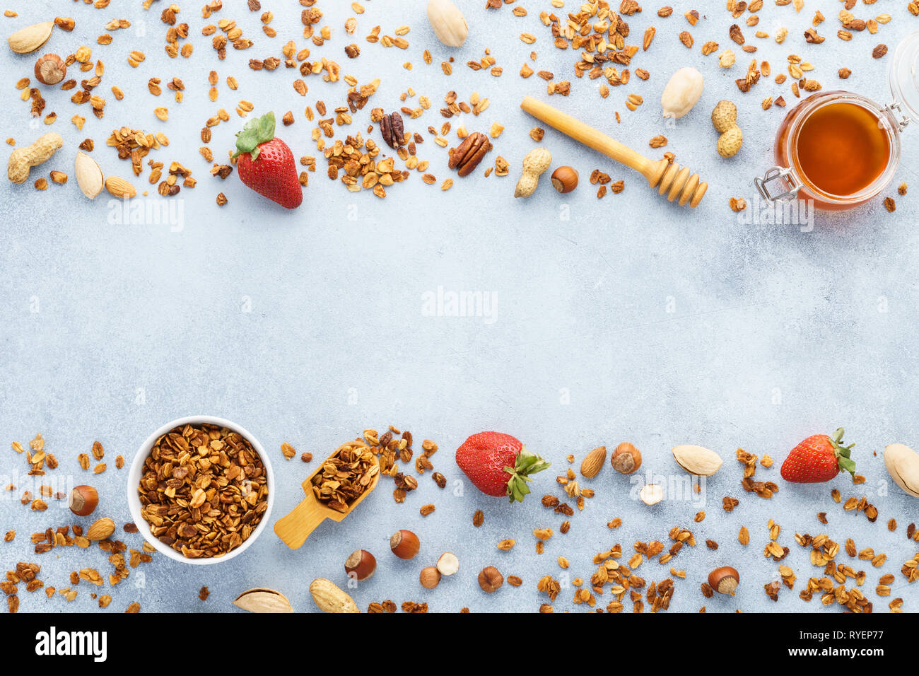 Granola and ingredients - oats, various nuts and honey. Healthy ...