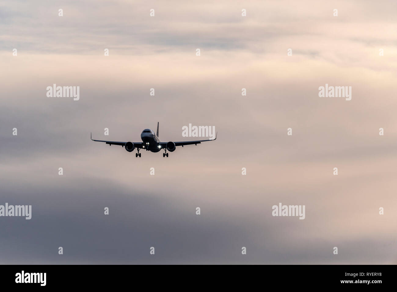 Plane on final approach to land at London Heathrow Airport, London, UK ...