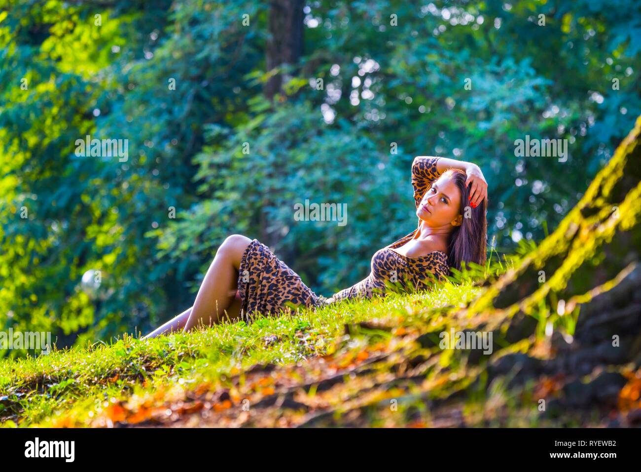 Adolescent teen laying lying down position posture Stock Photo - Alamy