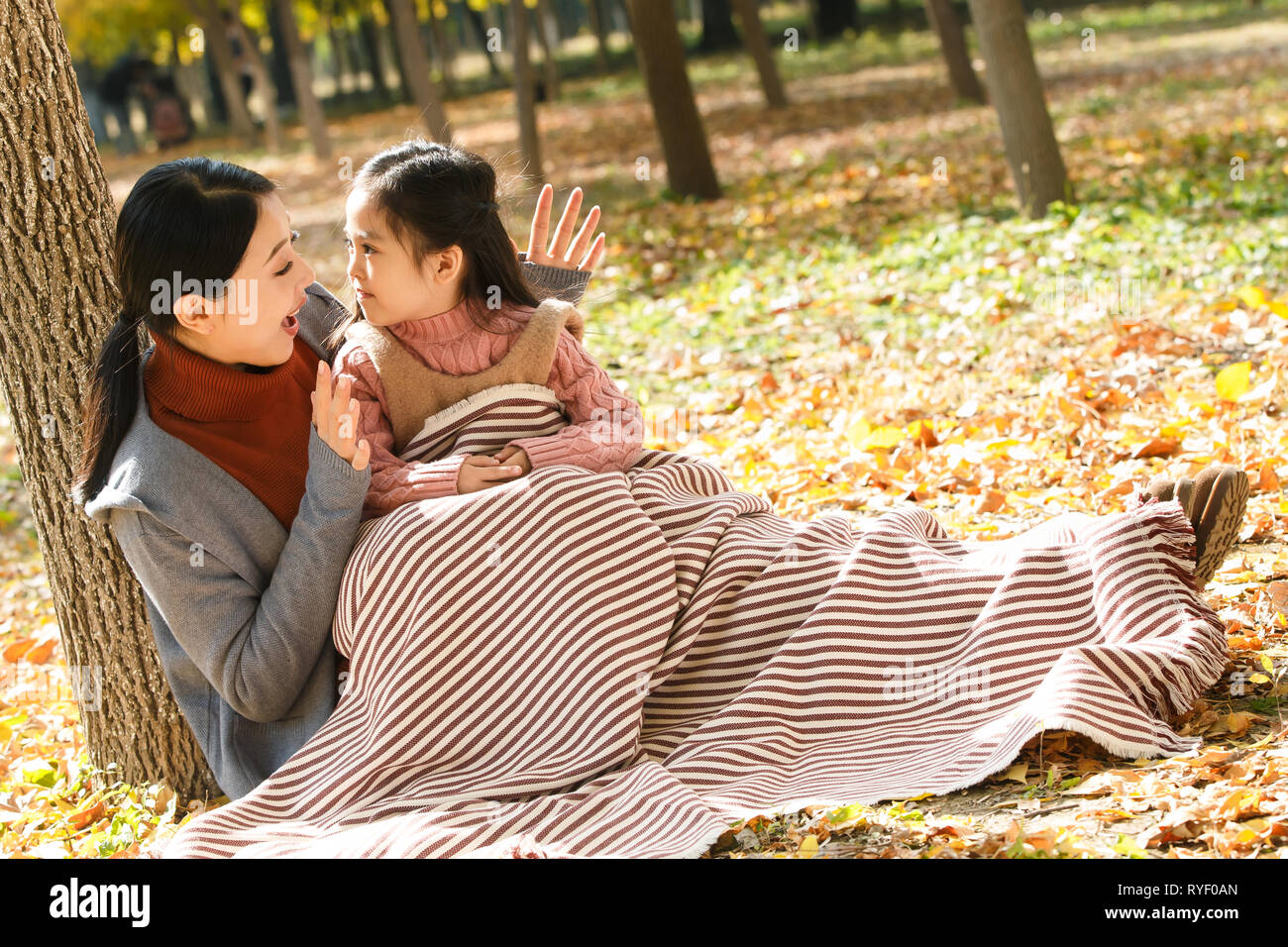 My mother and daughter play outdoors Stock Photo - Alamy