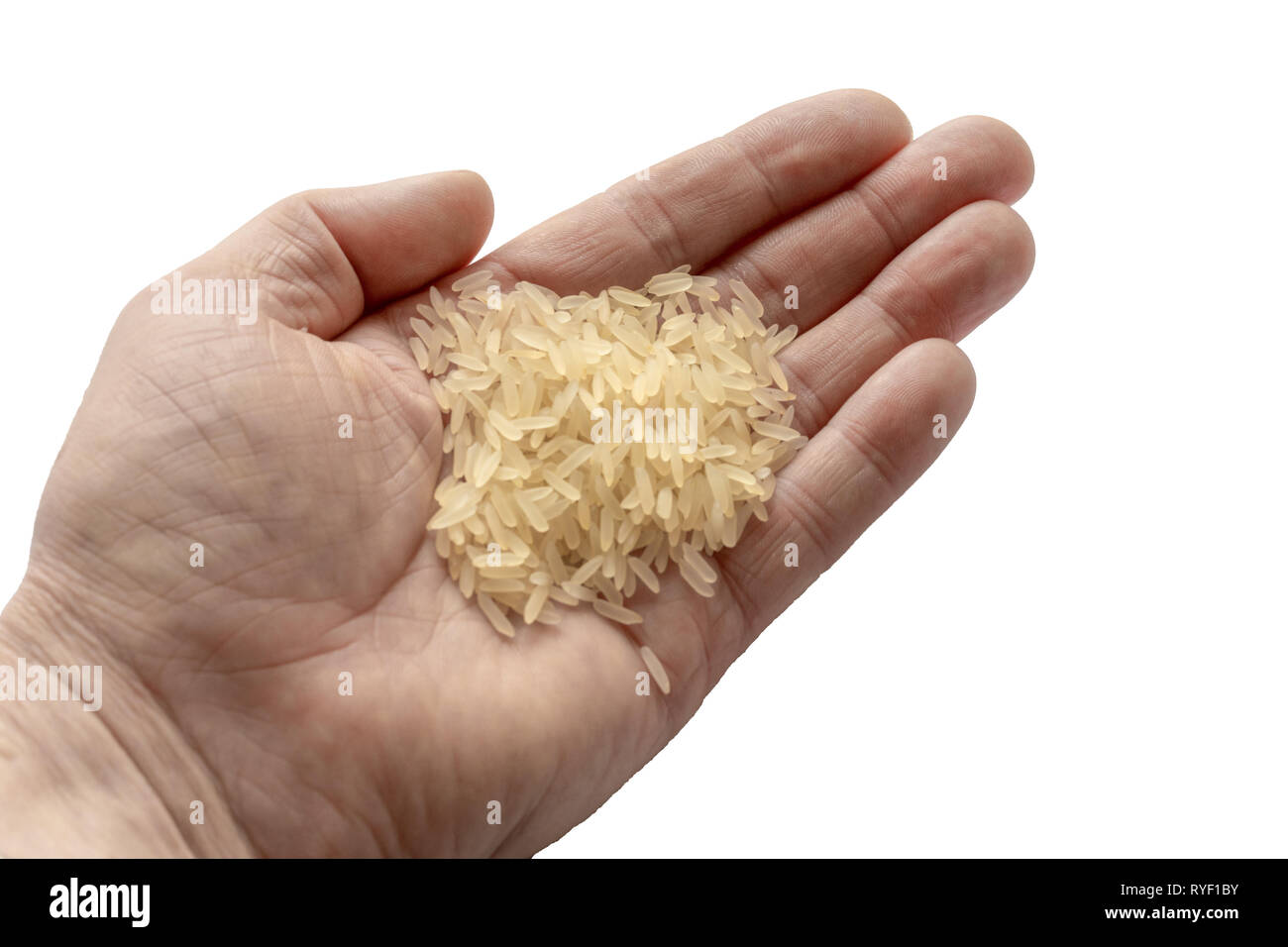 Handful of rice isolated on white background Stock Photo - Alamy