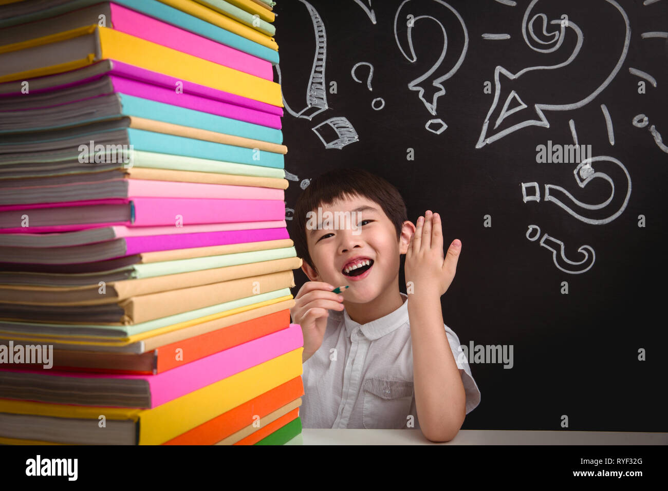 Primary school students and textbooks Stock Photo - Alamy