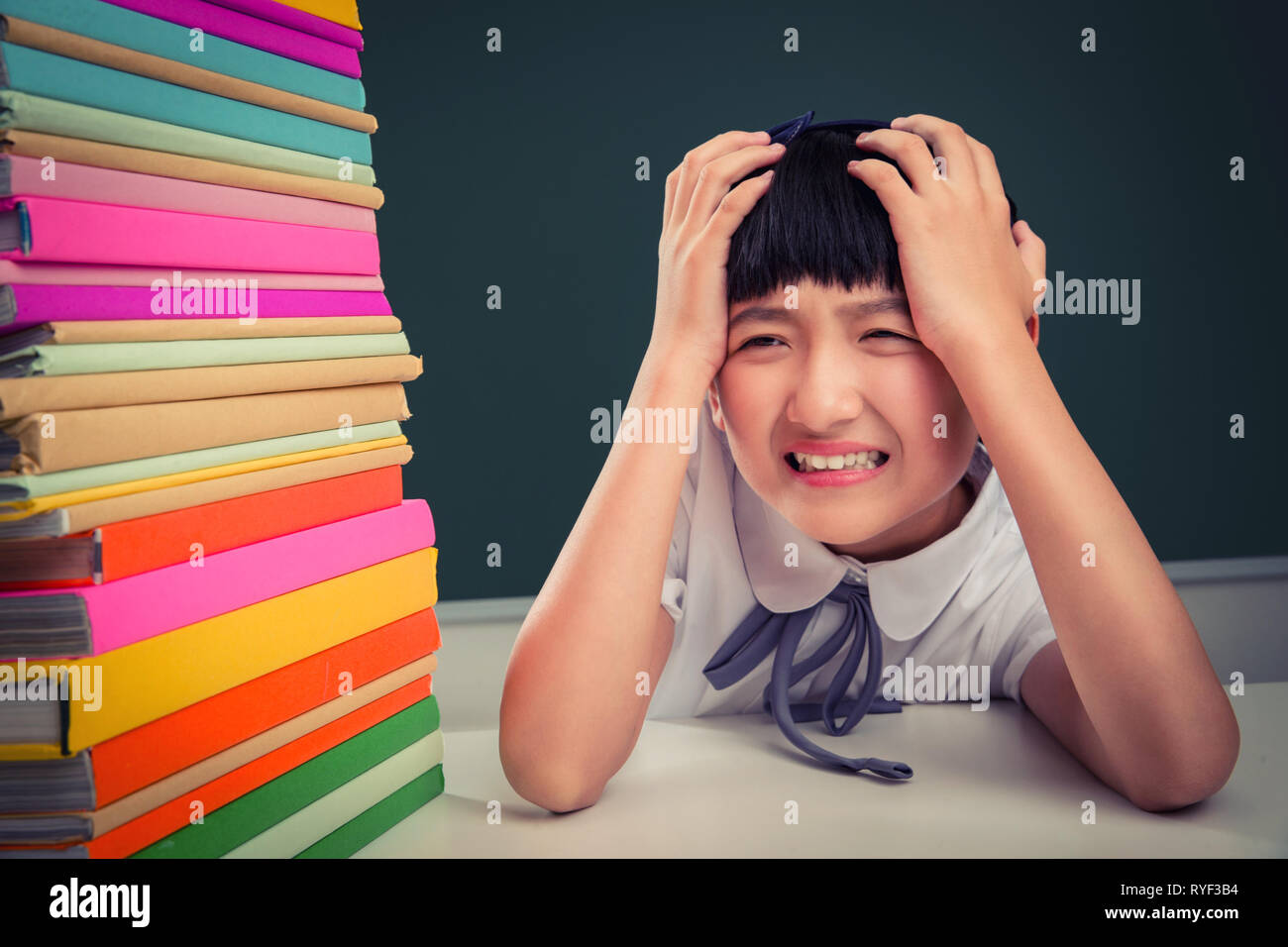 Primary school students and textbooks Stock Photo - Alamy