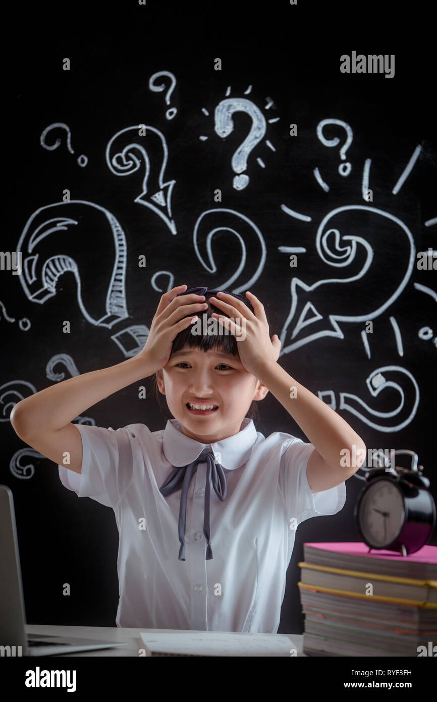 Frustration of elementary school girls Stock Photo - Alamy