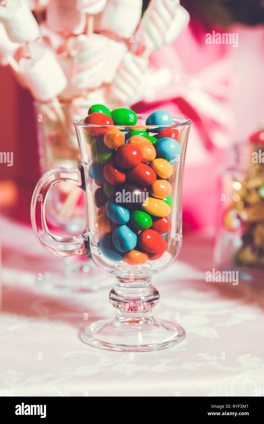 Colorful candy . Multi colored sweets . Colored candy in a glass ...