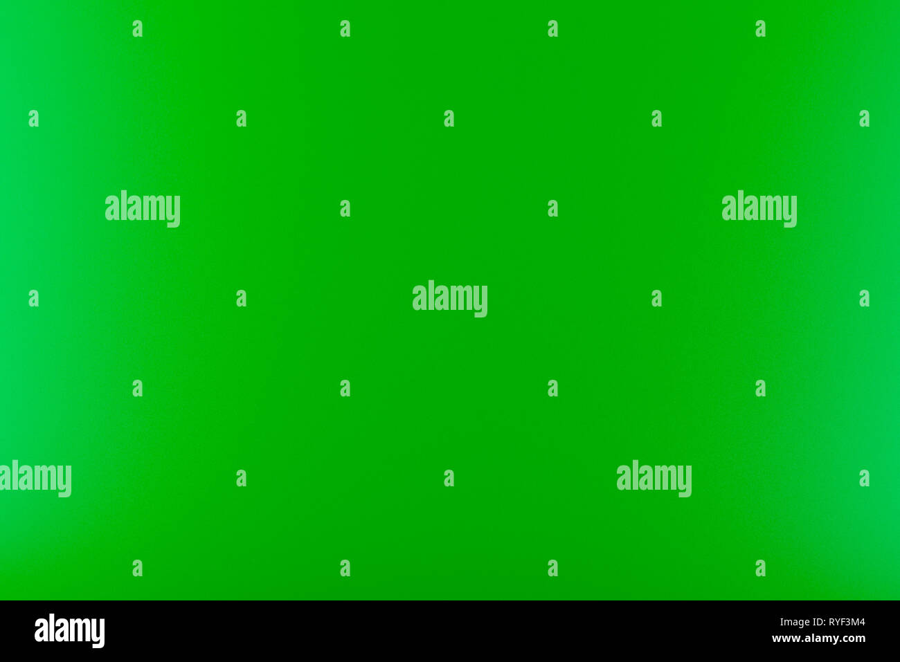 Texture in a bright, green color illuminated with a delicate light ...