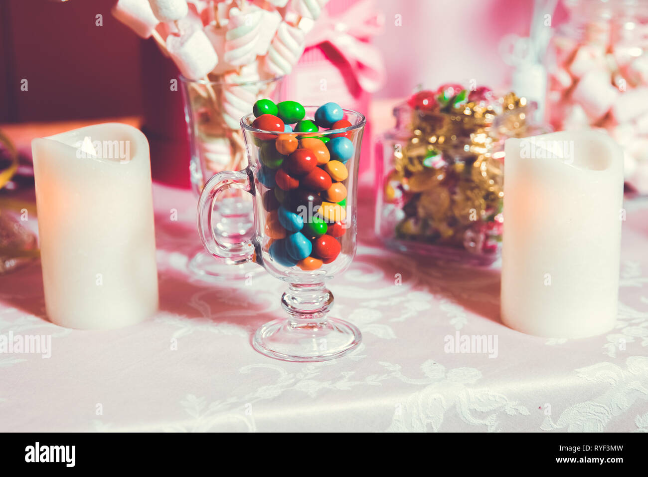 Colorful candy . Multi colored sweets . Colored candy in a glass ...