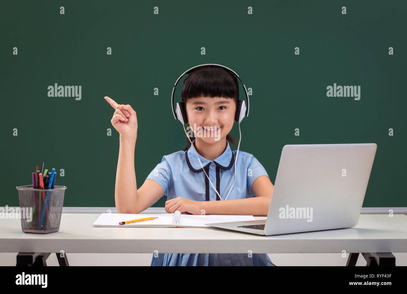 Primary school girls online learning Stock Photo - Alamy