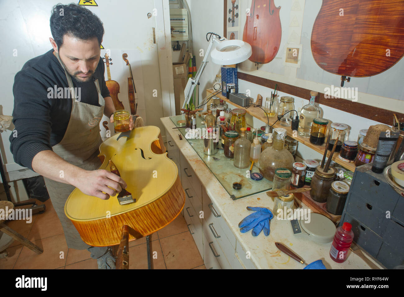 Europe, Italy, Lombardy, Cremona, workshop of artisan luthier. Master ...