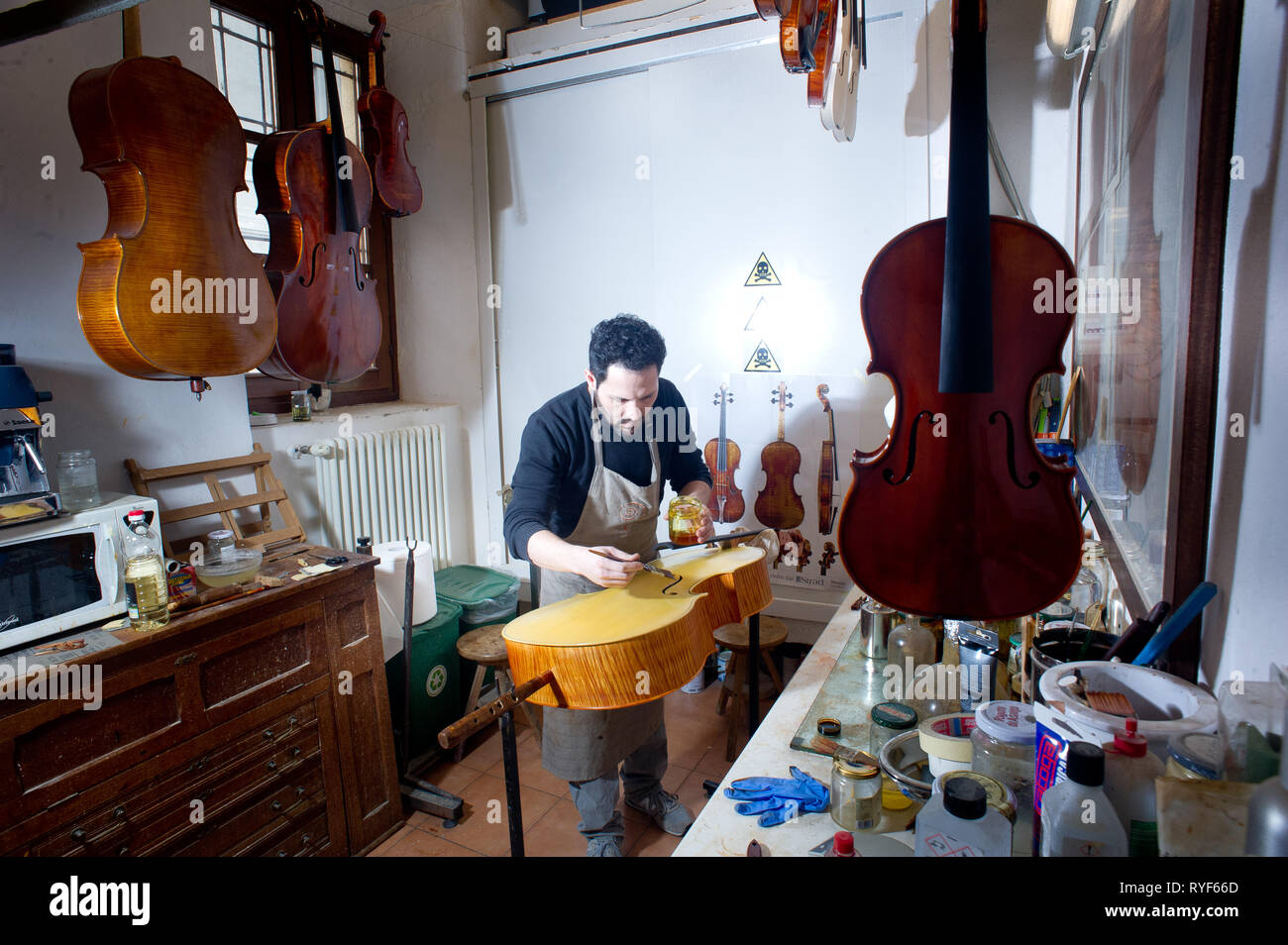 Europe, Italy, Lombardy, Cremona, workshop of artisan luthier. Master ...
