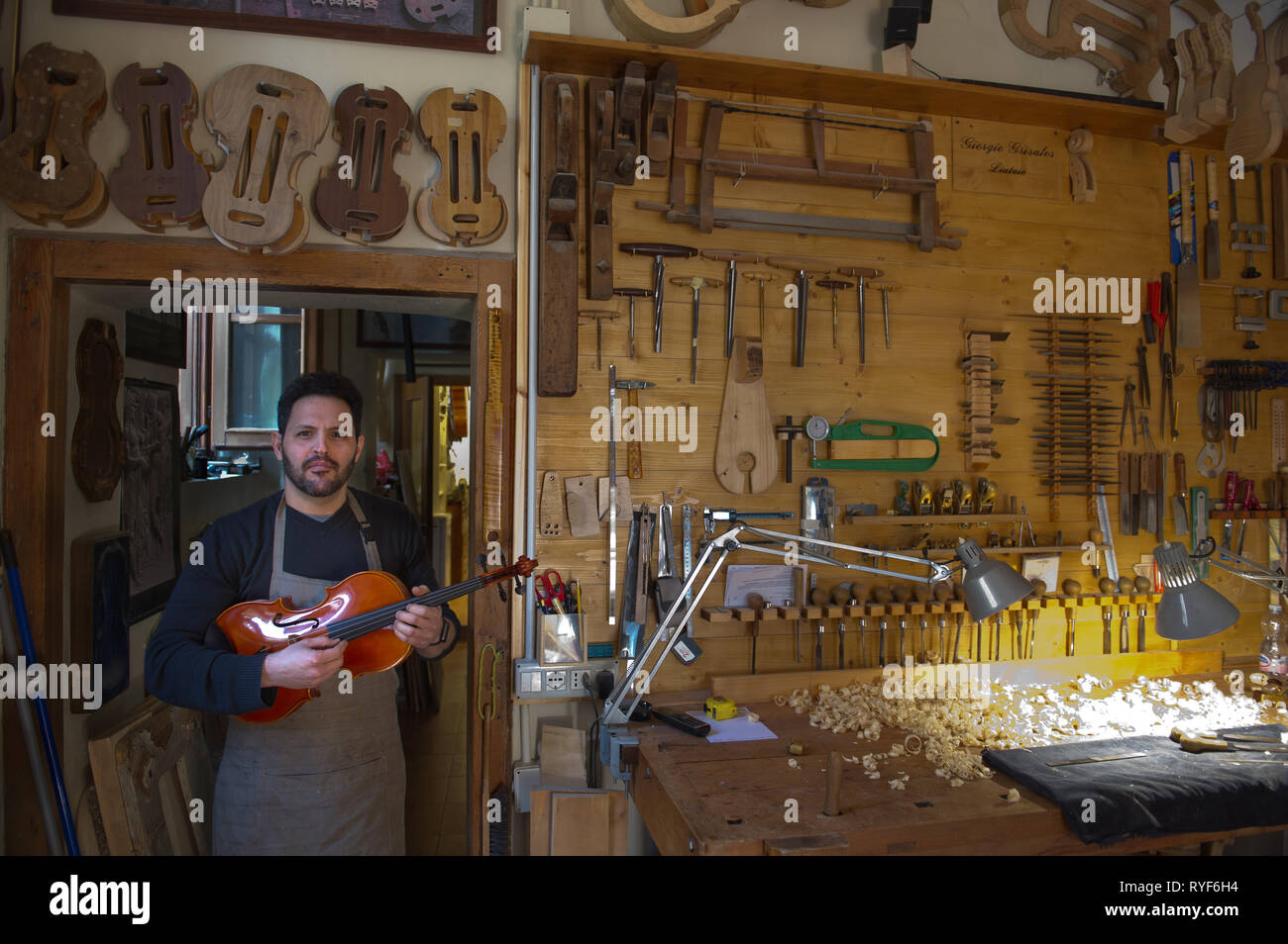 Europe, Italy, Lombardy, Cremona, workshop of artisan luthier. Master ...