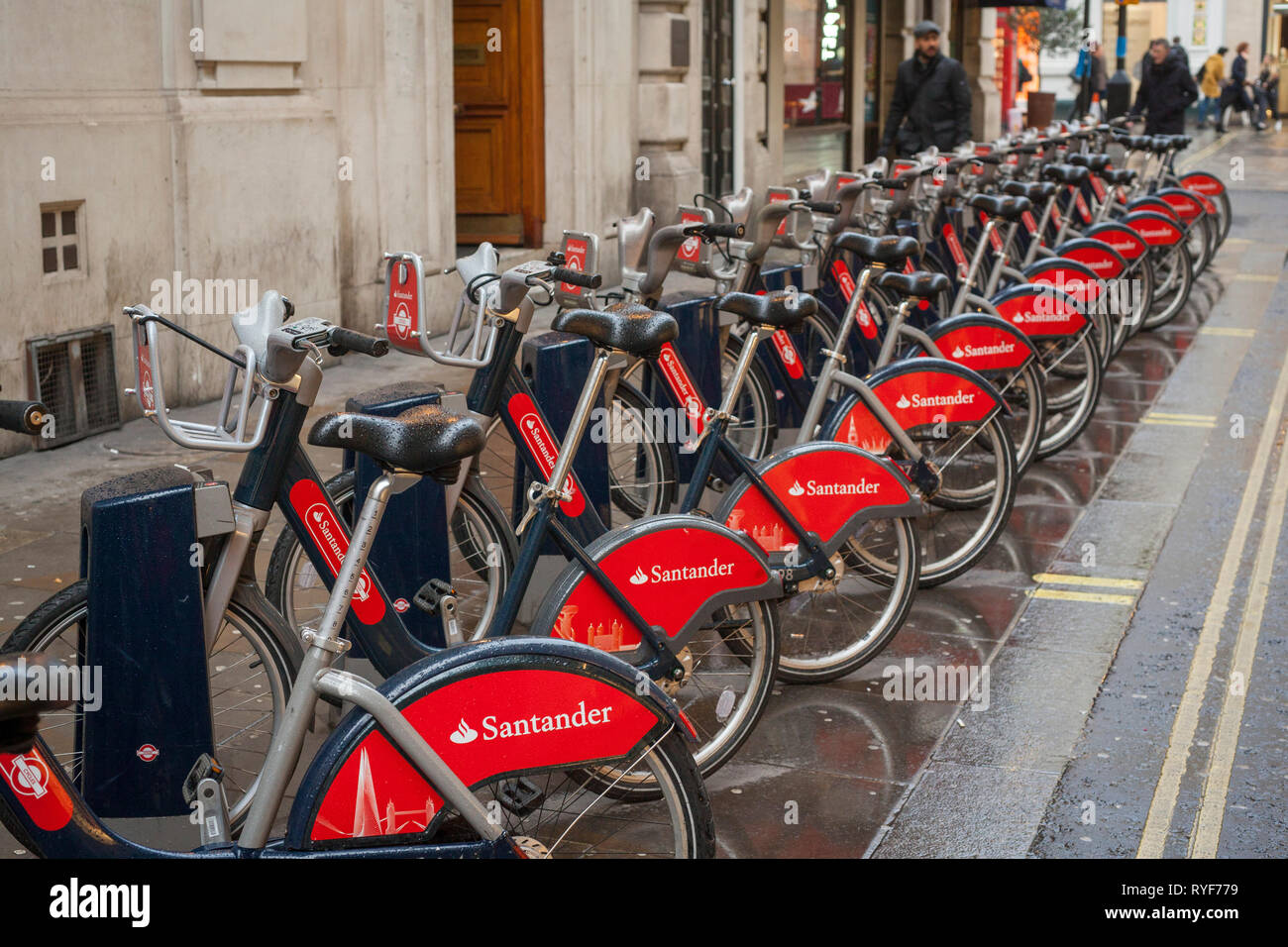 A line of Santander hire bikes in Soho, London Stock Photo - Alamy