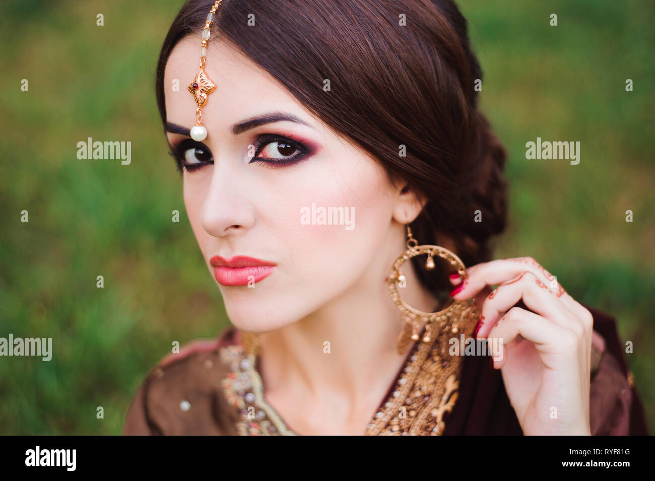Mehndi tattoo. Woman Hands with black henna tattoos. India national ...