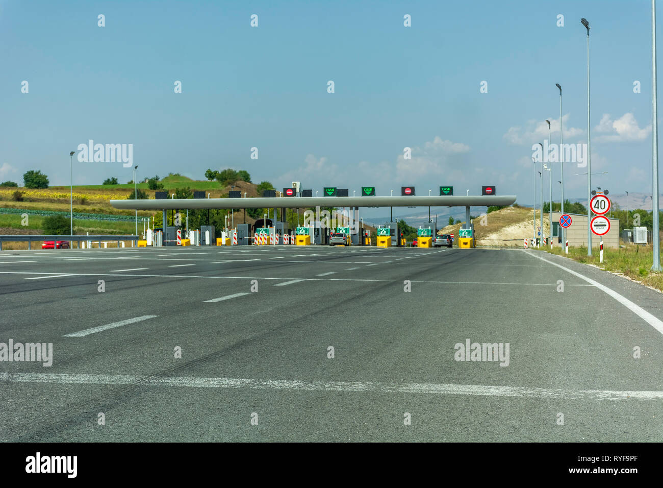 Pay toll check point - Toll booths at highway freeway autobahn Stock ...