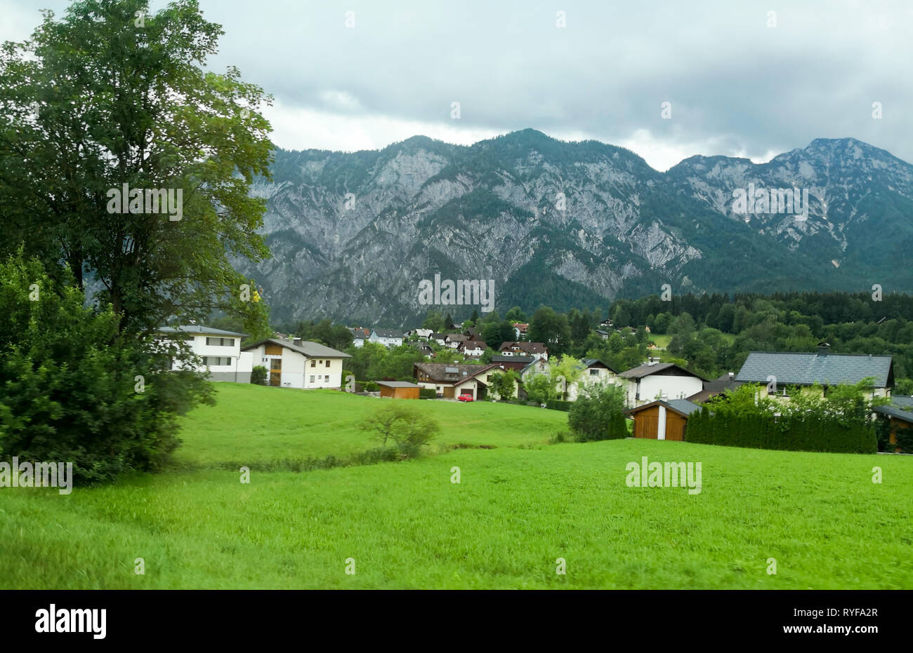 panoramic view of some houses in a valley Stock Photo - Alamy