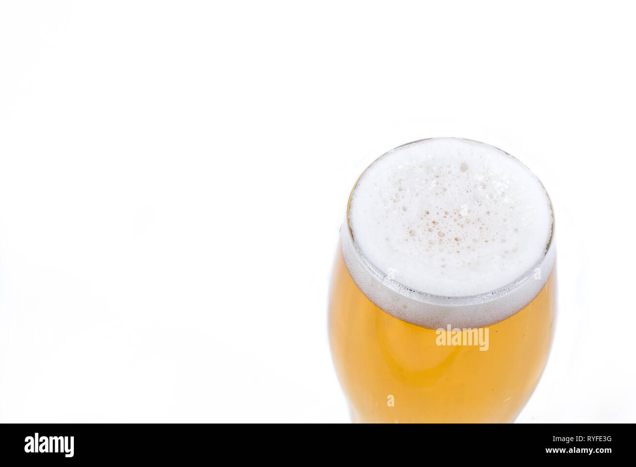 A glass of frothy, foamy bubbly beer isolated in white Stock Photo - Alamy