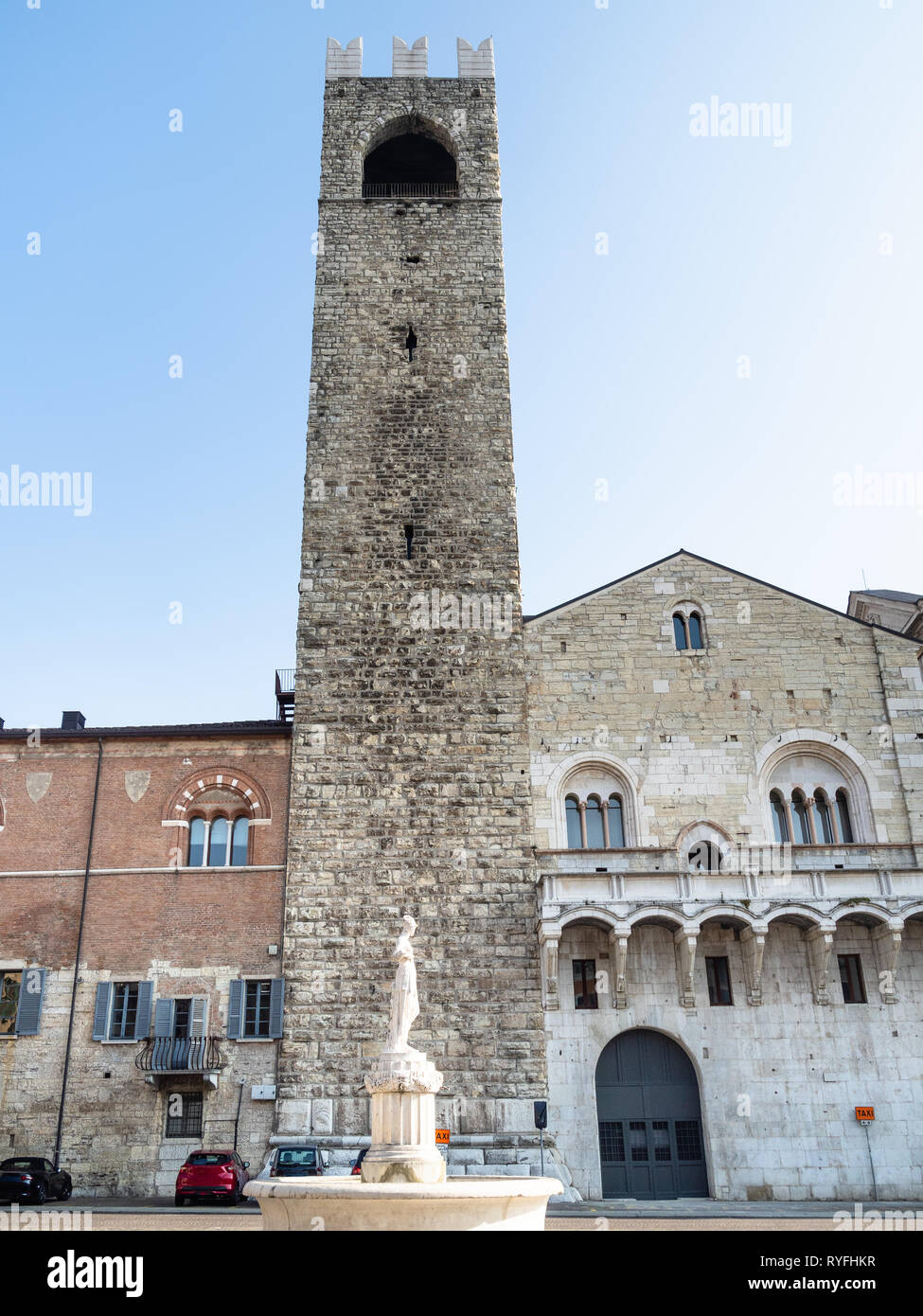 Travel to Italy - front view of town hall Broletto, tower Torre del ...