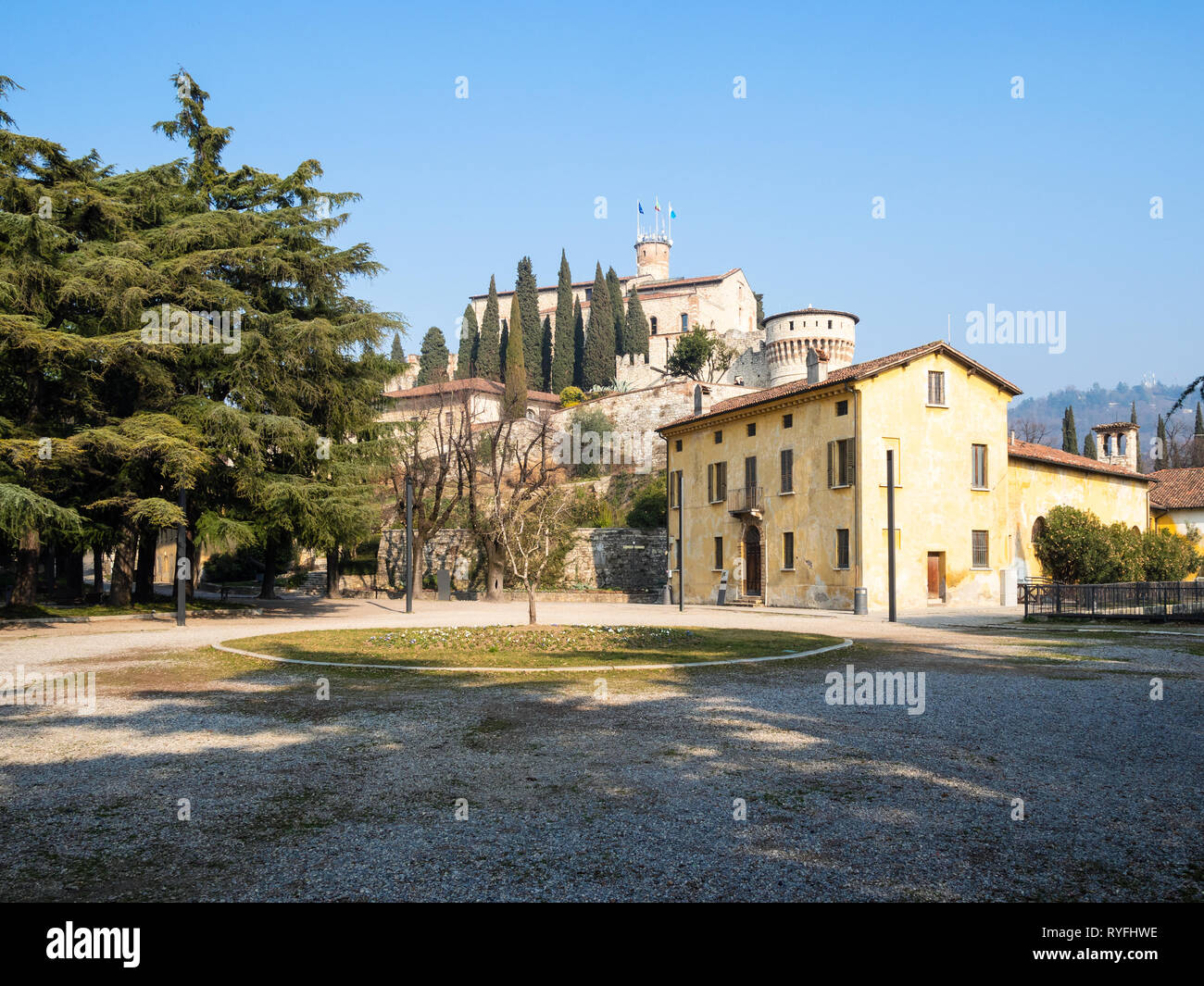 Travel to Italy - public park in court and fortress of Castello di ...