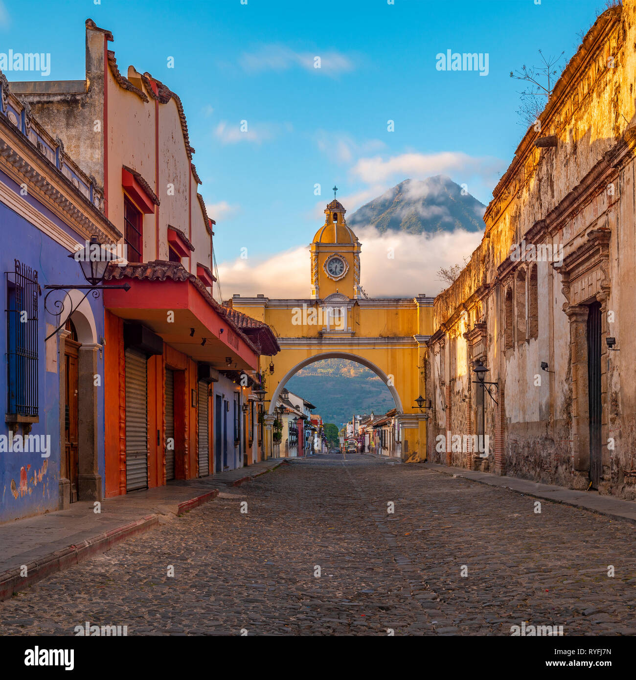 Cityscape of the Agua volcano and Antigua main street at sunrise with ...