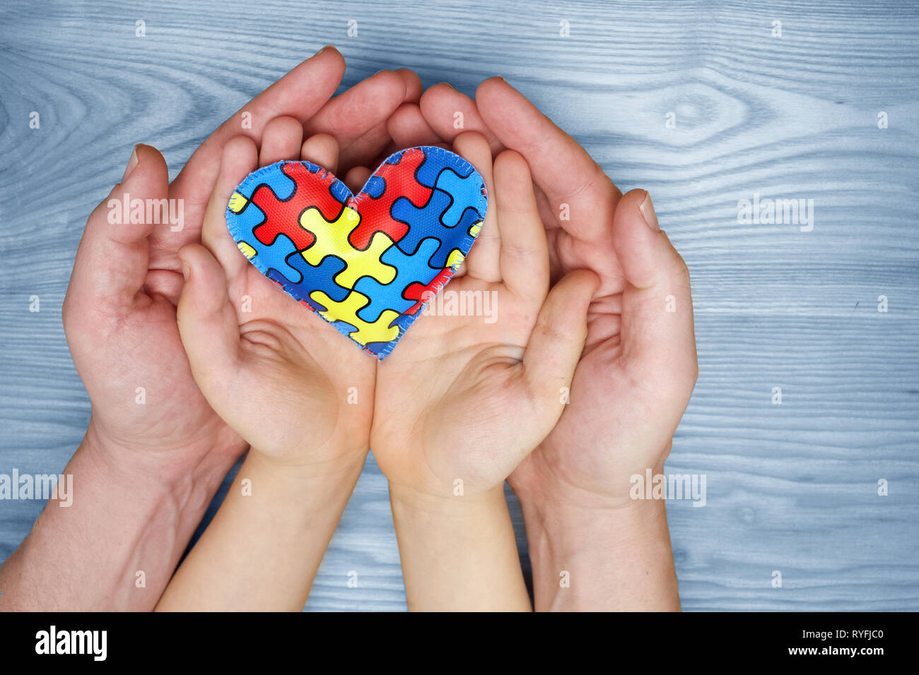 World Autism Awareness day, puzzle or jigsaw pattern on heart with ...