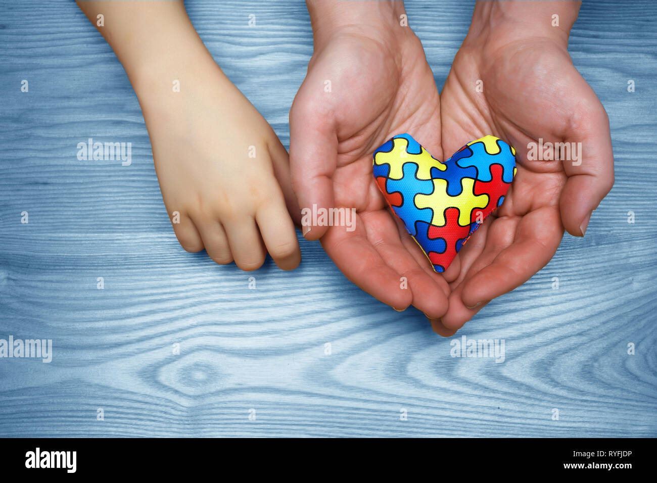 World Autism Awareness day, puzzle or jigsaw pattern on heart with ...